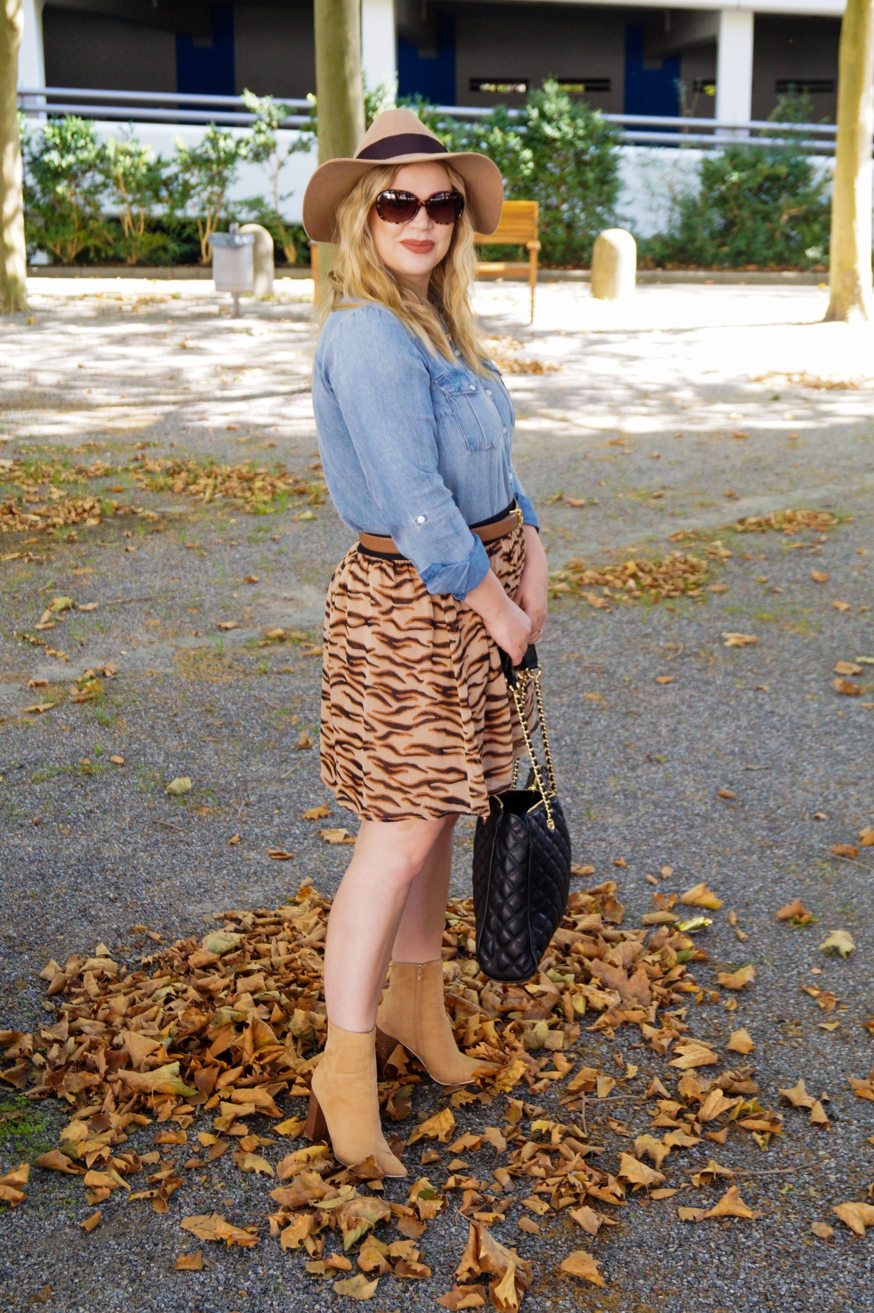 Tiger print skirt plus the cutest suede booties... - Madame Schischi